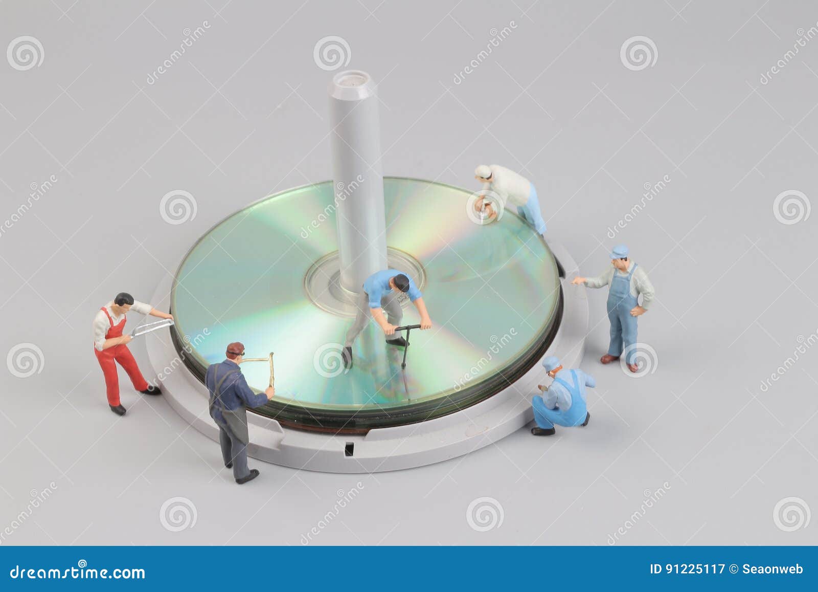 Mini Figure of the Worker Around the Disk Stock Image - Image of ...