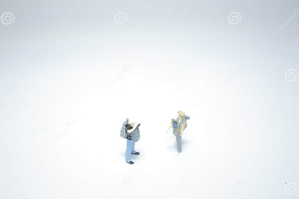 A Mini Figures with Backpack at Board Stock Image - Image of ...