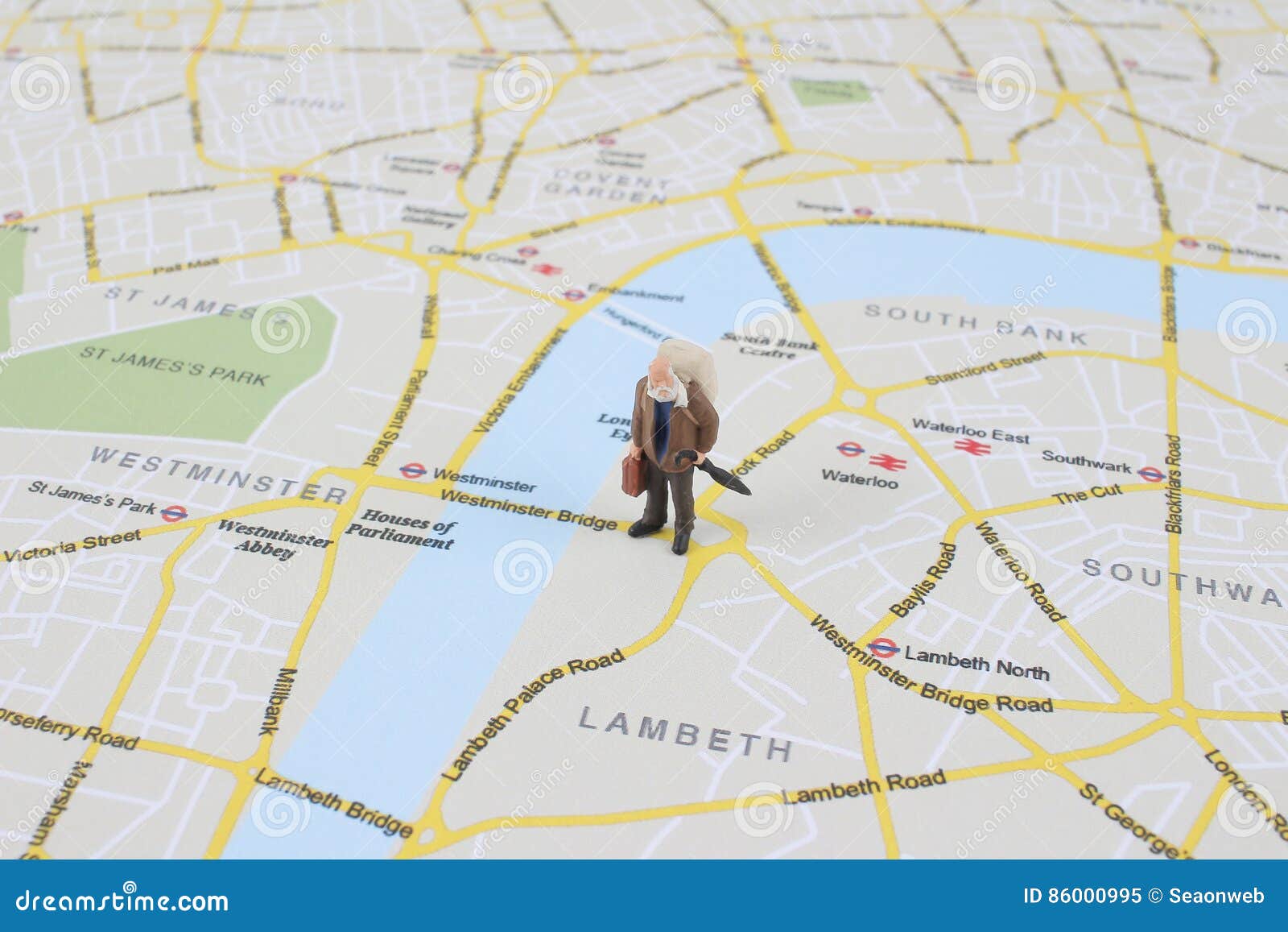 Mini figures stand on map stock image. Image of worldwide - 86000995