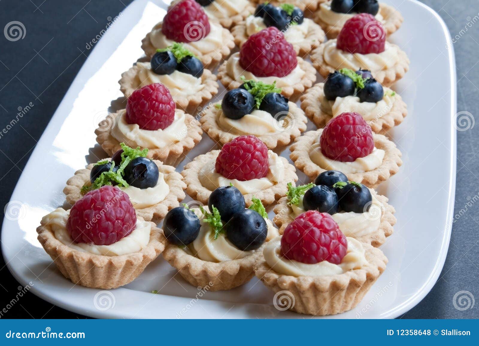 Mini Fruit Tarts stock photo. Image of seeds, party, white - 12358648