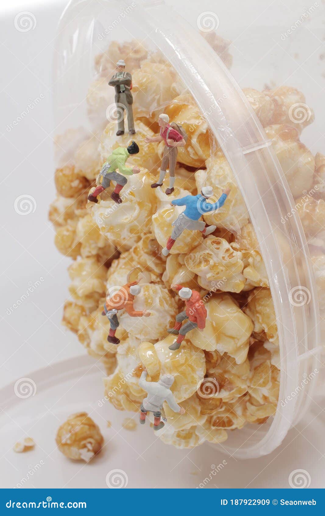 A Mini and Fun Figure Climb the Popcorn Wall Stock Image - Image of ...
