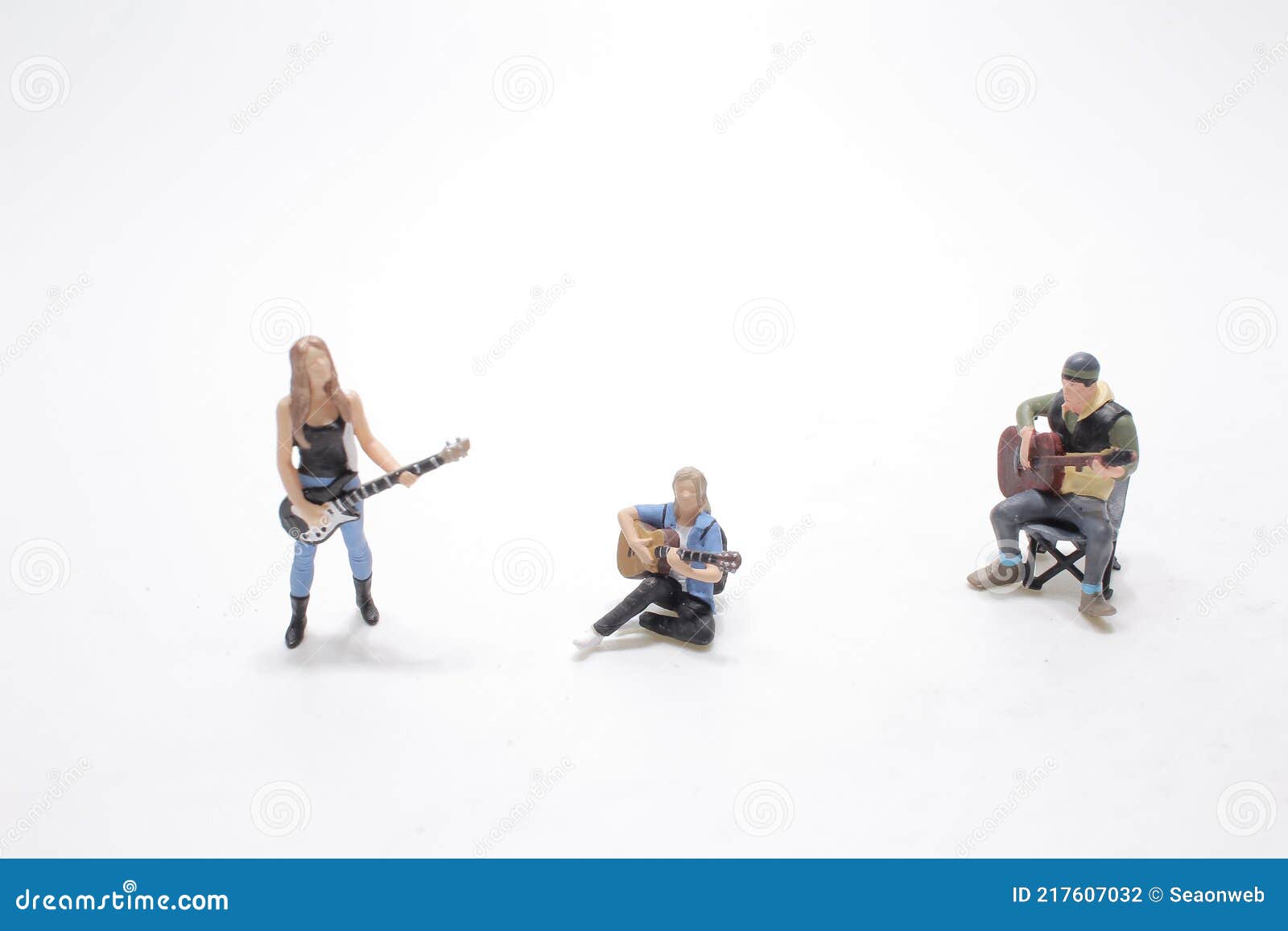 A Mini of Fun Figure Playing Guitar Stock Photo - Image of pride ...