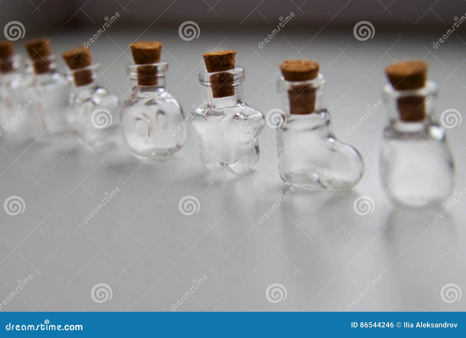 Mini Glass Bottles Different Forms with Cork Stopper on White ...