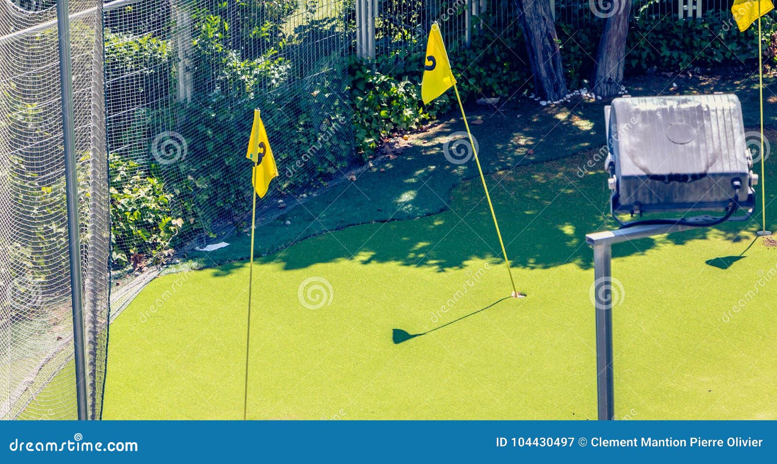 Mini Golf Practice in Town with Green and Flags Stock Image - Image of ...