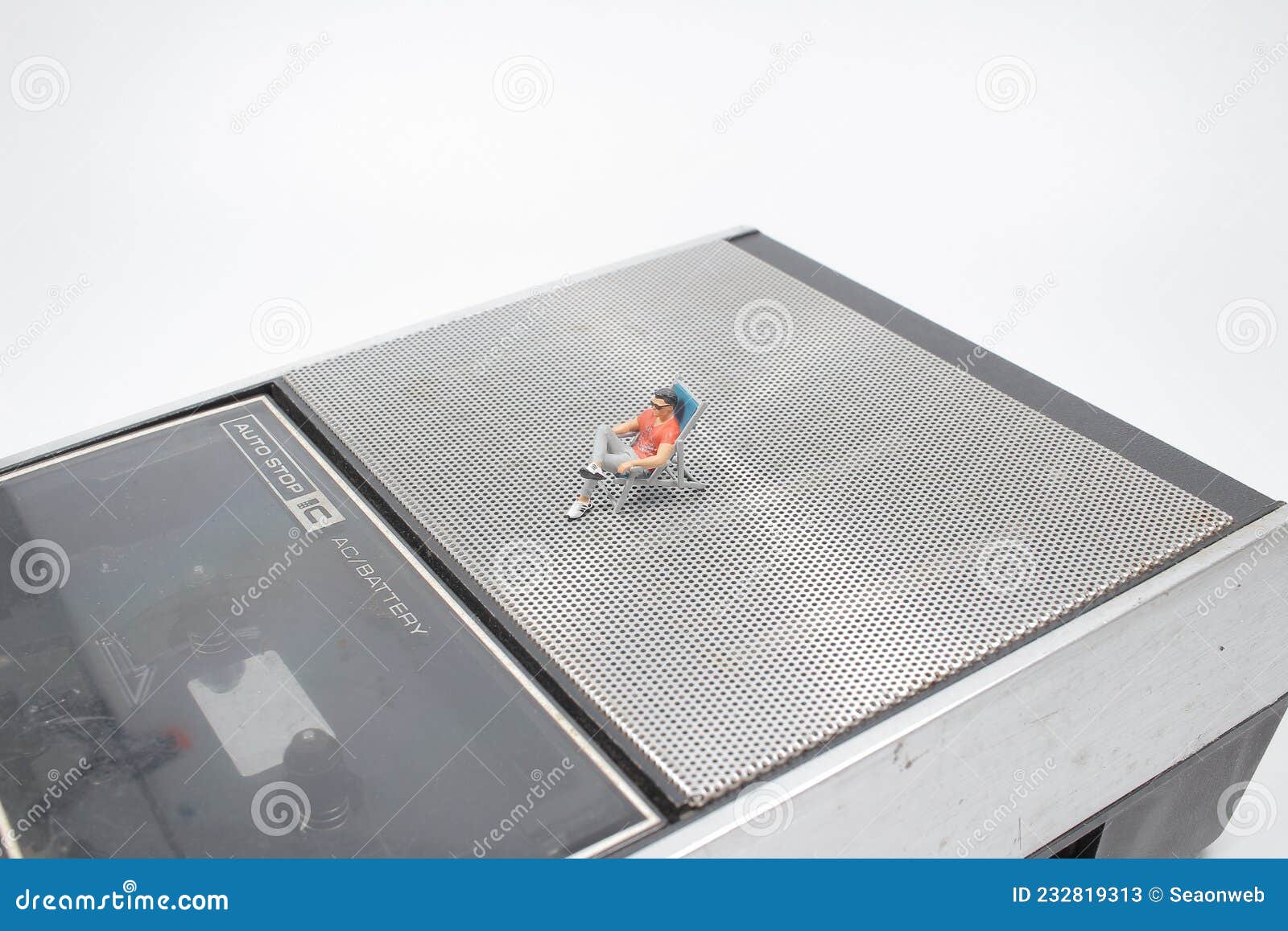 The Mini Happy on Beach Chair, Cassette Machine Stock Image - Image of ...