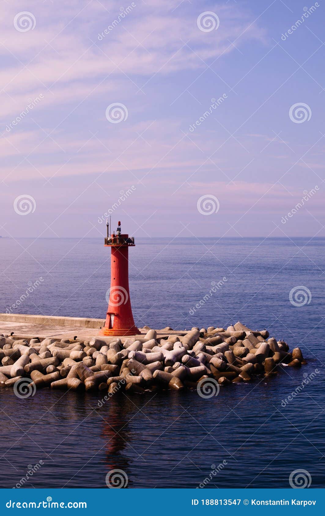 Mini Lighthouse on the Coast. Small Red Lighthouse on the Pier Stock ...