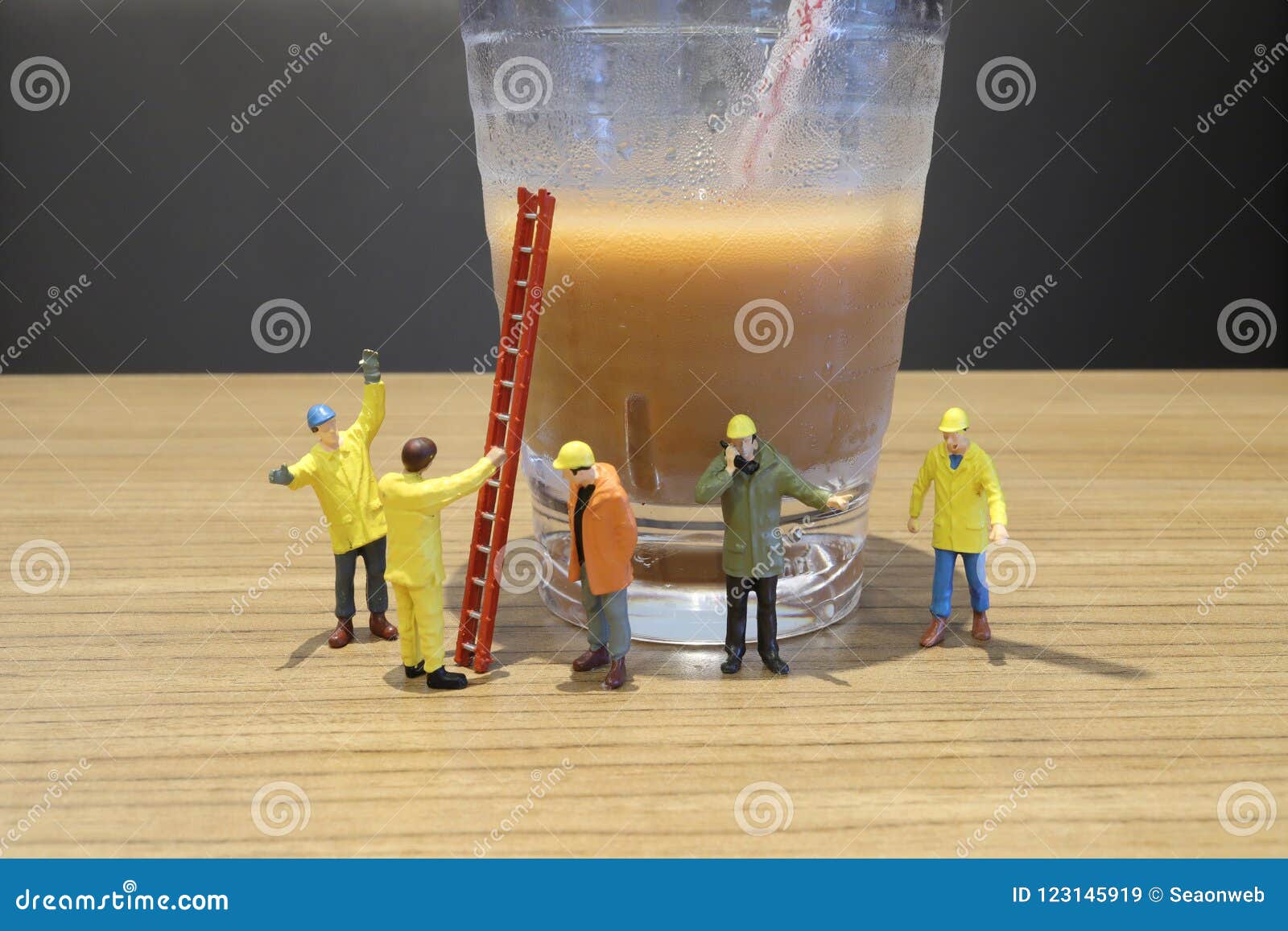 The Mini Male Workers Figure with Cold Drink Stock Image - Image of ...