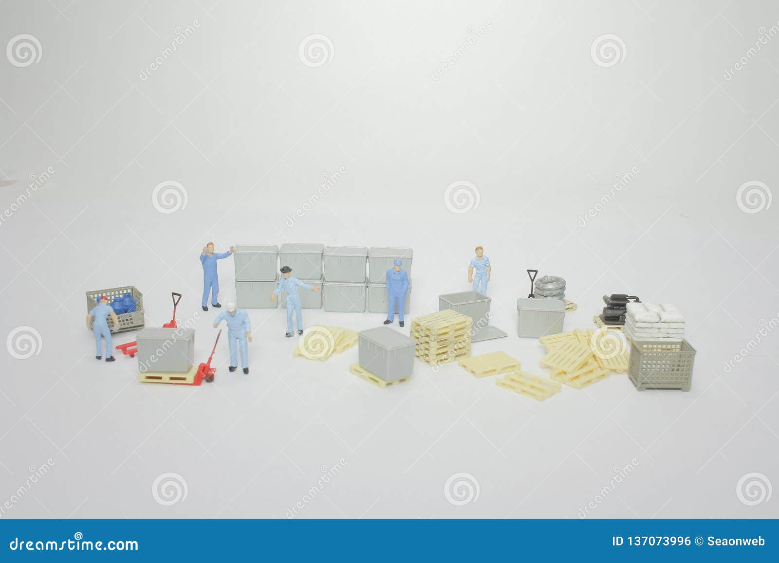 Mini Man Worker Figure Using a Trolley Stock Photo - Image of delivery ...