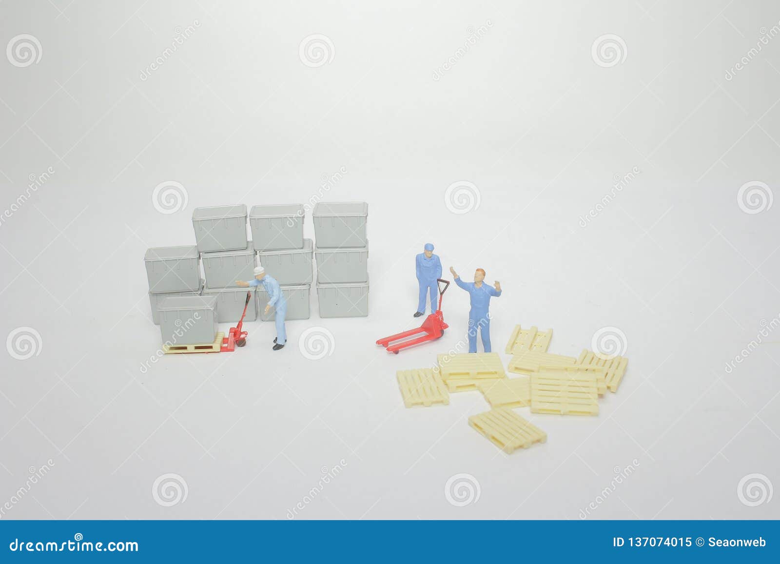 Mini Man Worker Figure Using a Trolley Stock Image - Image of loading ...