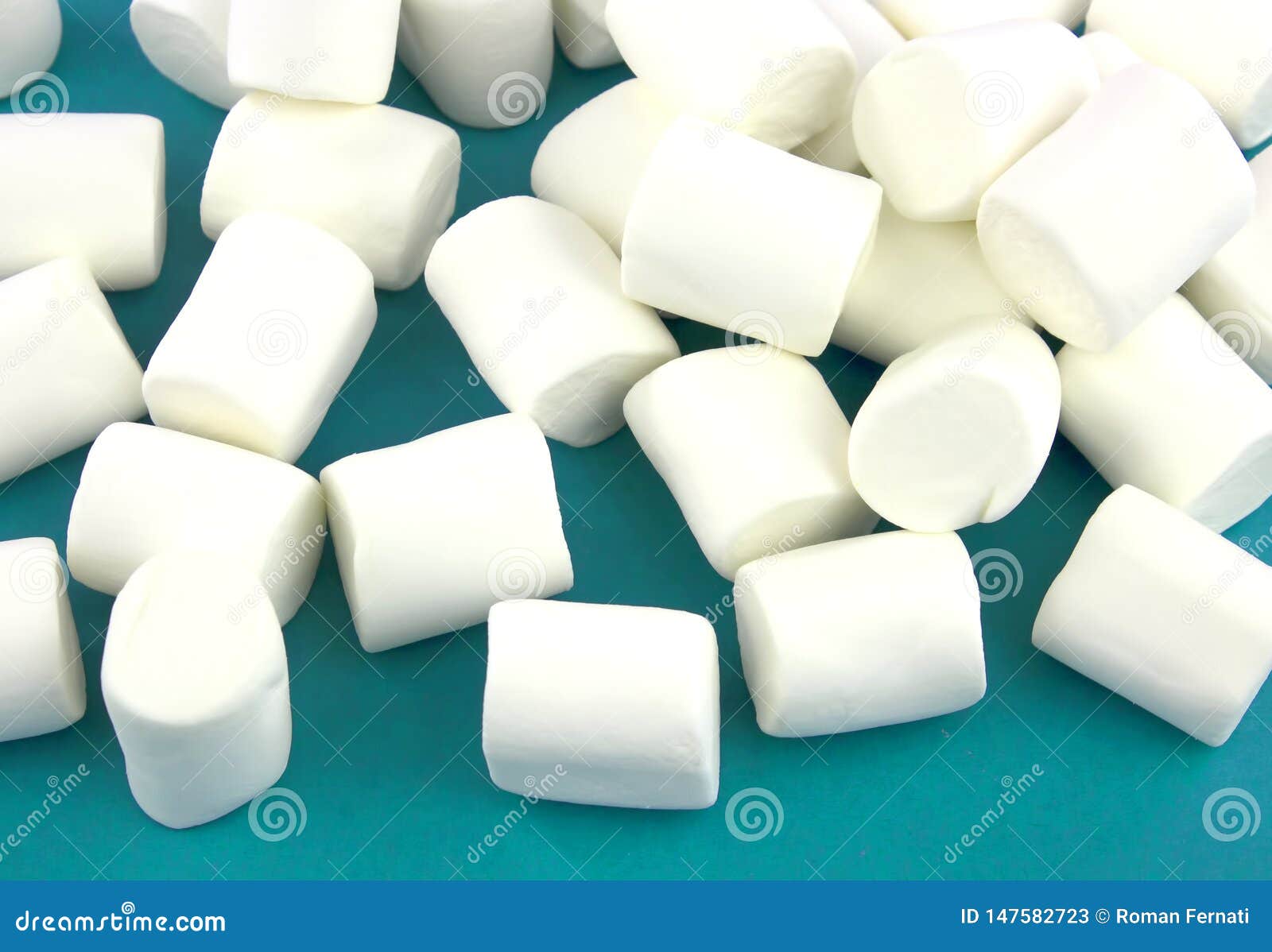 Mini Marshmallows on a Blue Background. Geometric Pattern of White ...