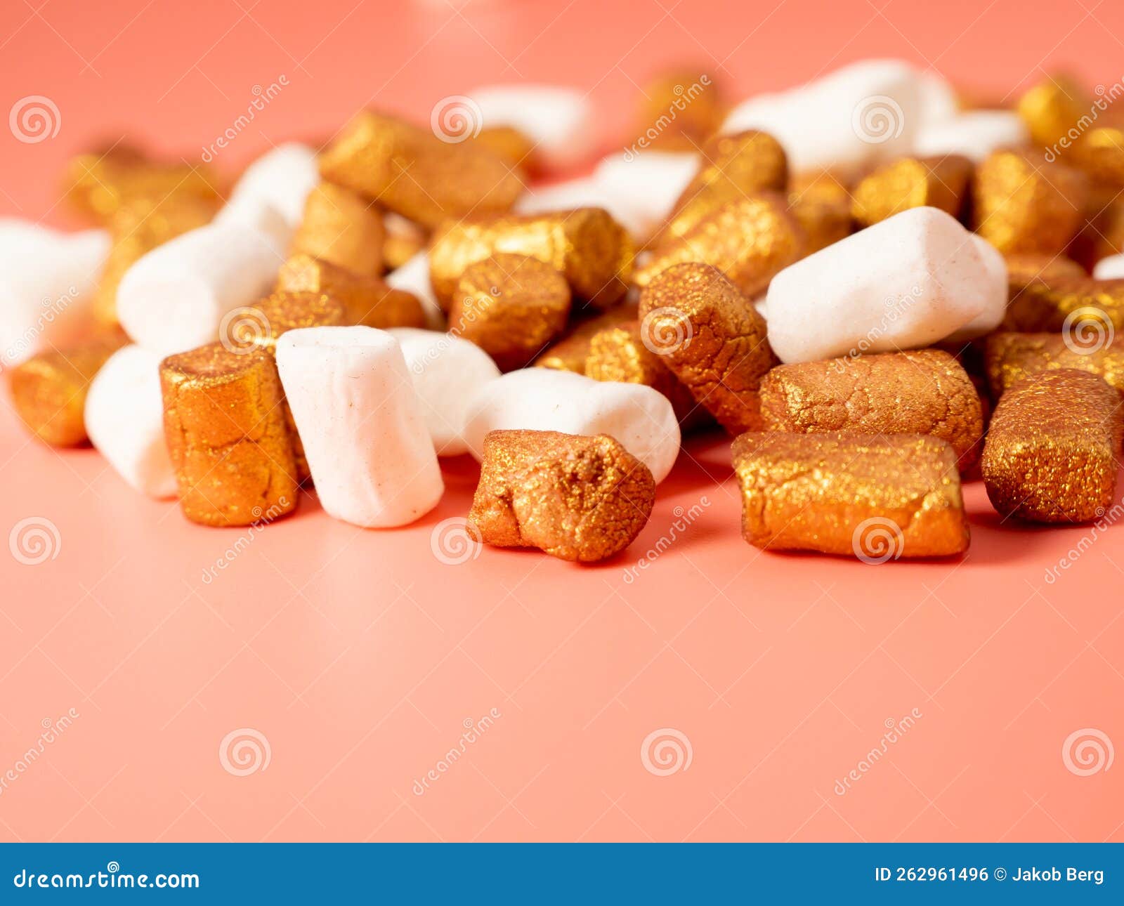 Mini Marshmallows on a Pink Background. Marshmallow Gold and White ...