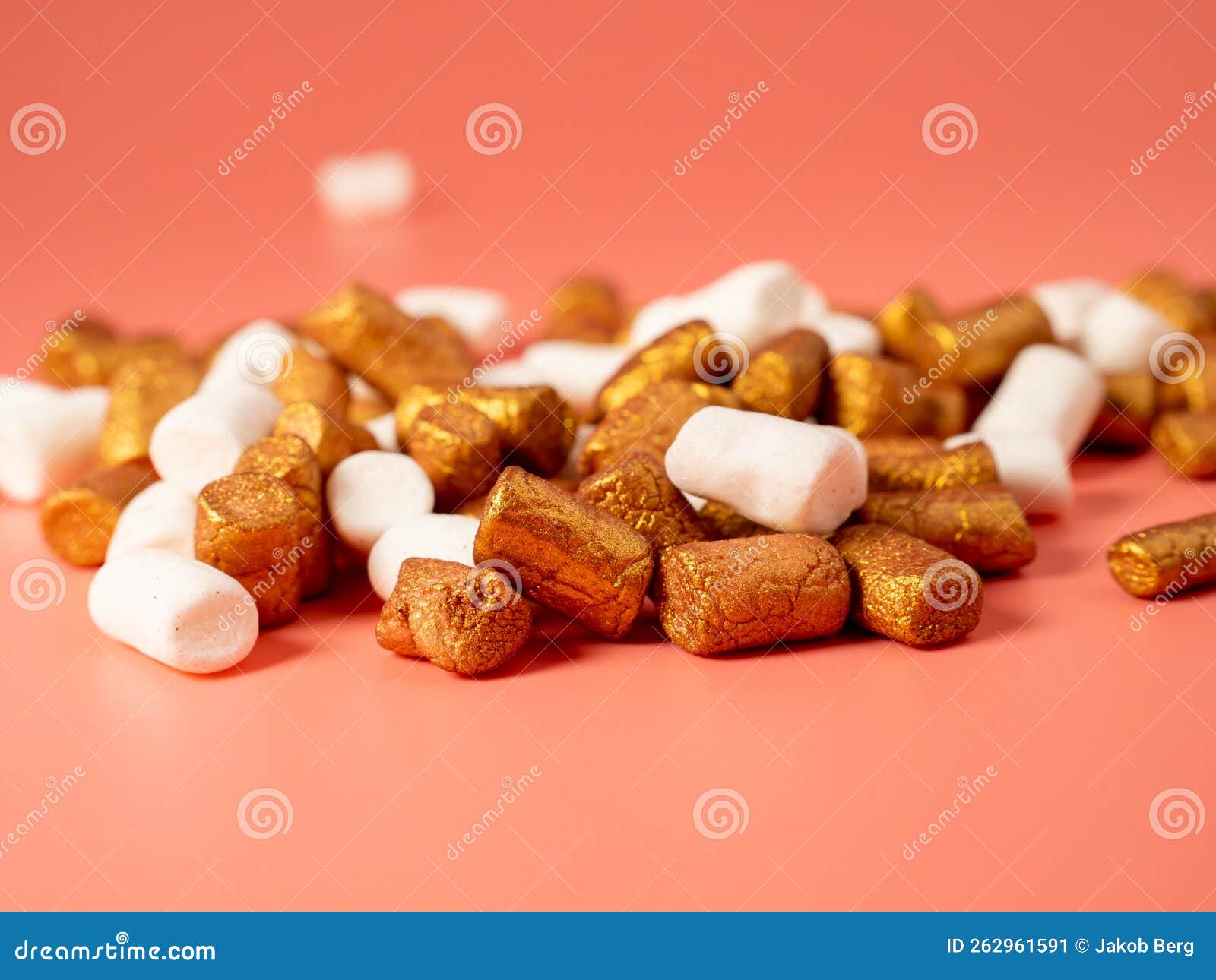 Mini Marshmallows on a Pink Background. Marshmallow Gold and White ...