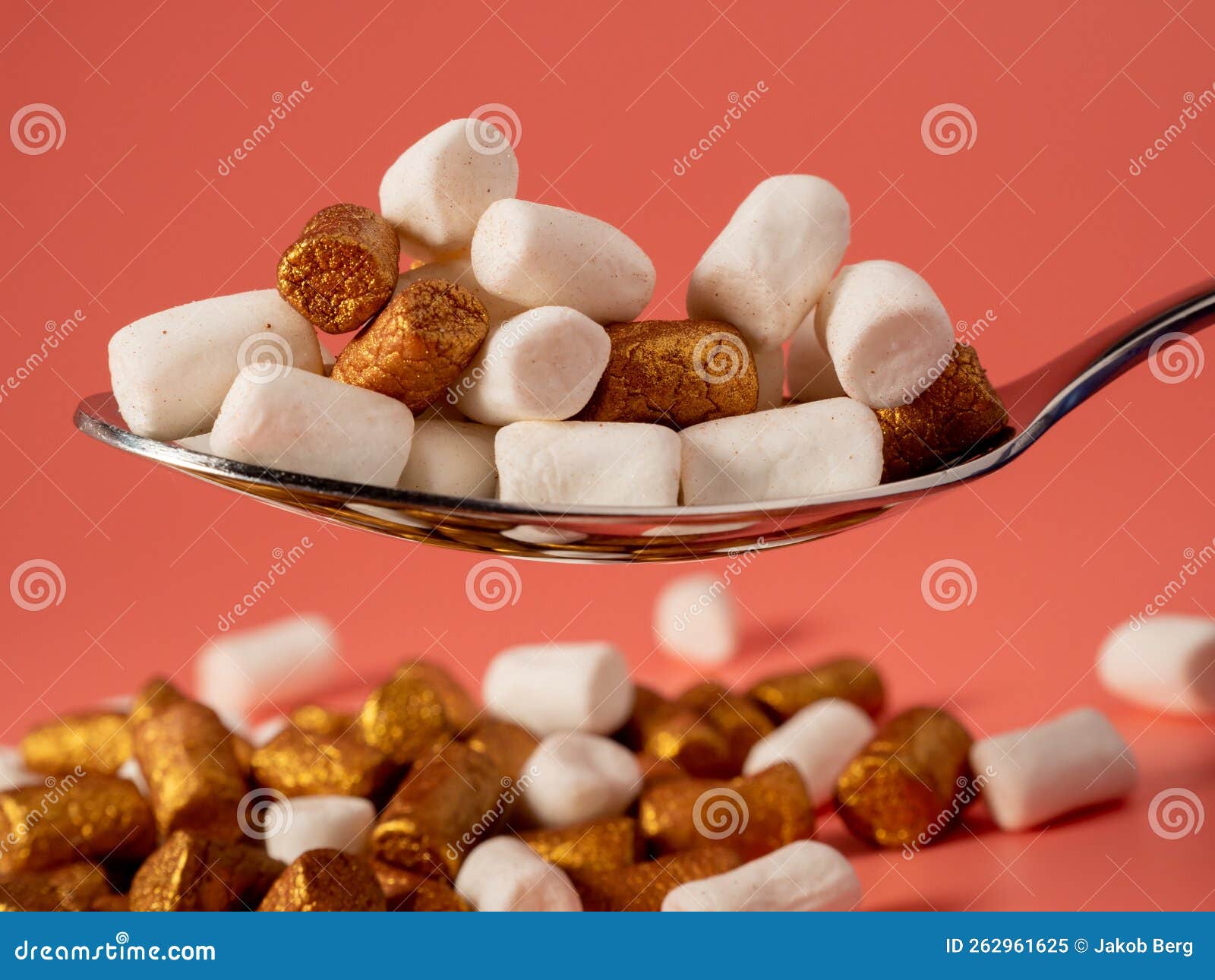 Mini Marshmallows on a Pink Background. Marshmallow Gold and White ...