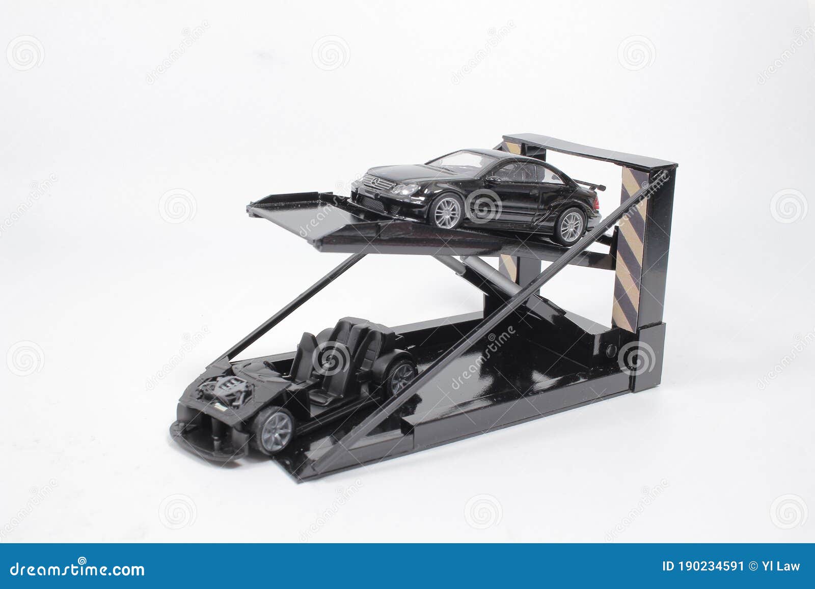 A Mini Mechanics Repairing Toy Car,concept of the Workshop Stock Image ...