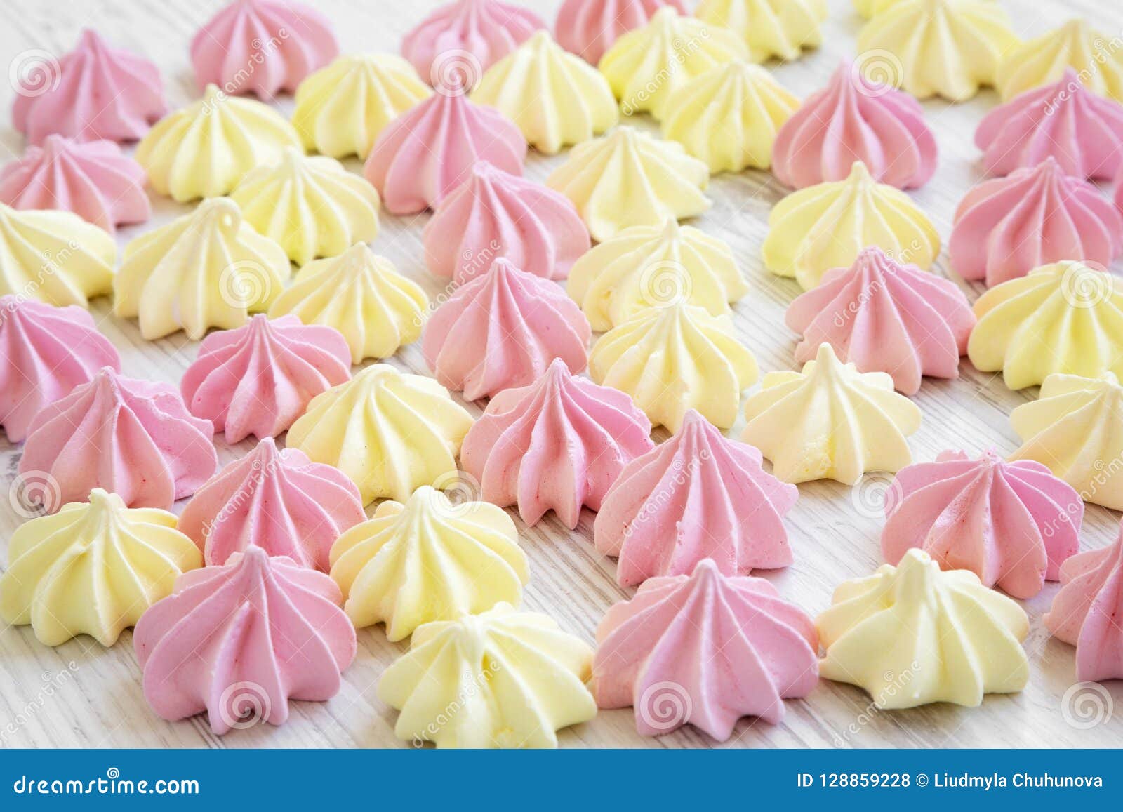 Mini Meringues on a White Wooden Surface, Side View. Selective Focus ...