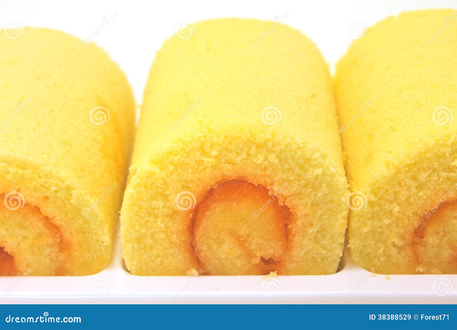 Mini orange jam rolls stock image. Image of roll, icing - 38388529
