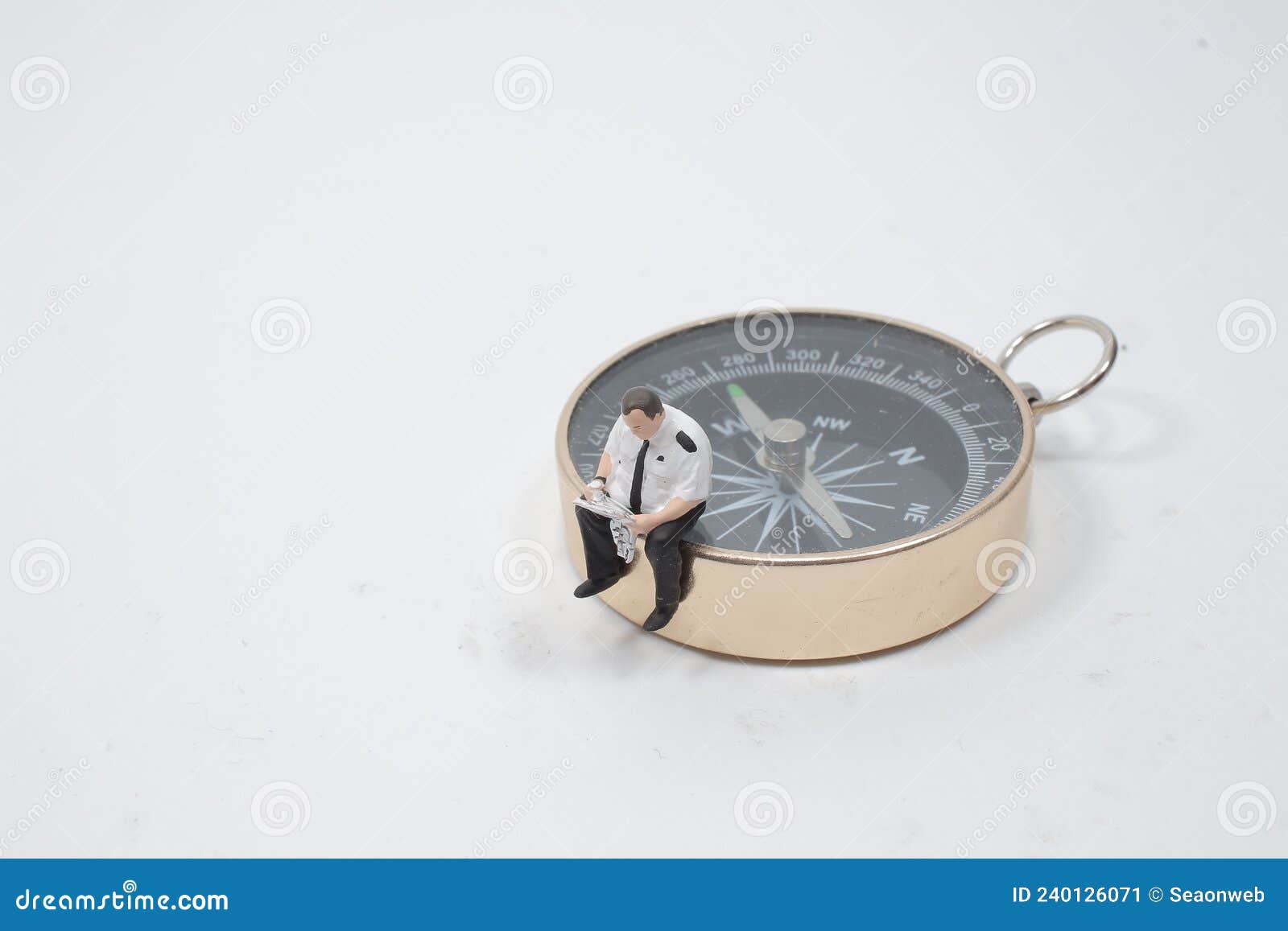 A Mini of Pilot Figure with Compass Stock Image - Image of arrow, globe ...
