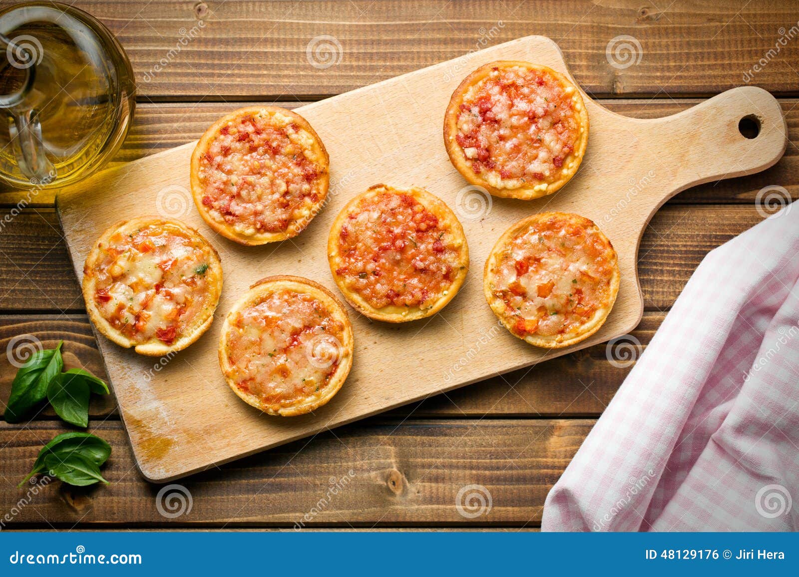 Mini Pizza Margherita With Parmesan Basil And Tomatoes On A Wooden ...