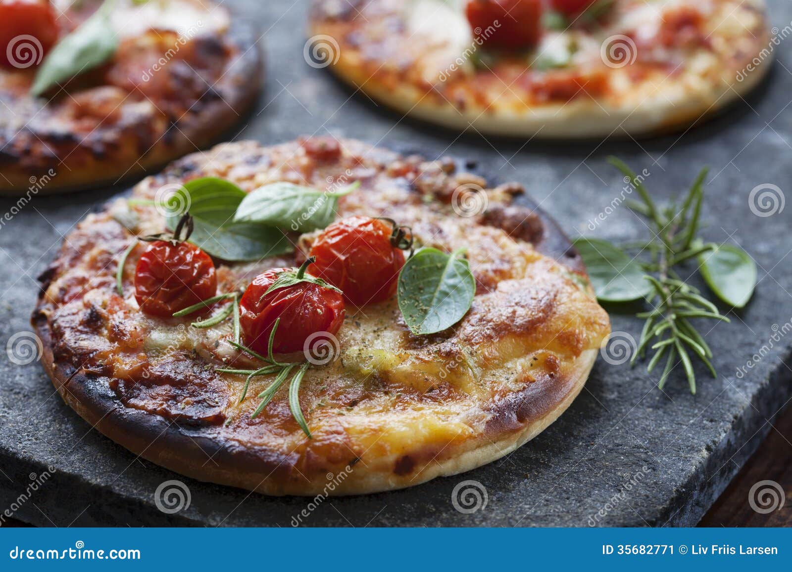 Mini pizzas stock image. Image of surface, vegetarian - 35682771
