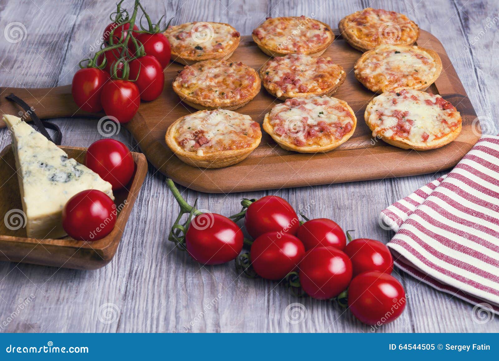 Mini Pizzas on a Wooden Table Stock Image - Image of cherry, cuisine ...
