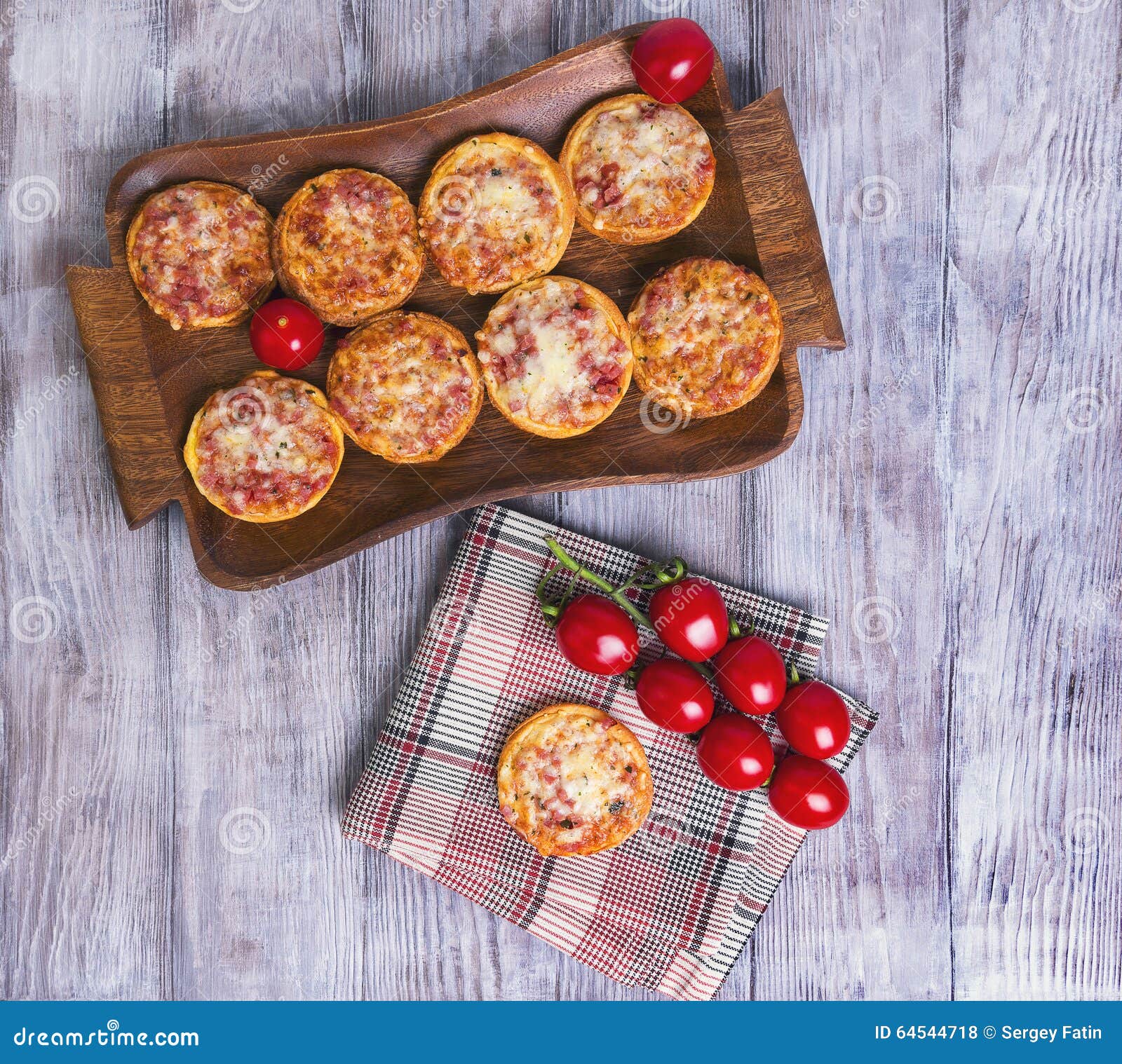 Mini Pizzas on a Wooden Table Stock Photo - Image of horizontal ...