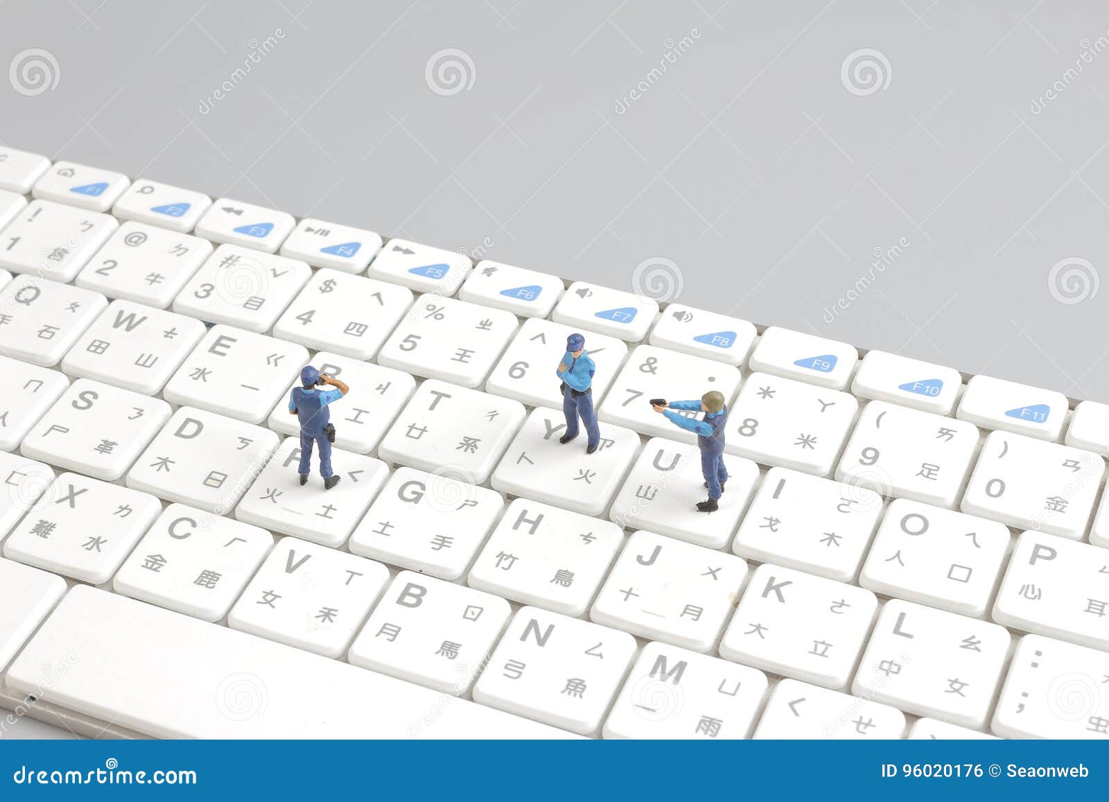 Mini Police Squad Protecting Laptop Computer Stock Photo - Image of ...