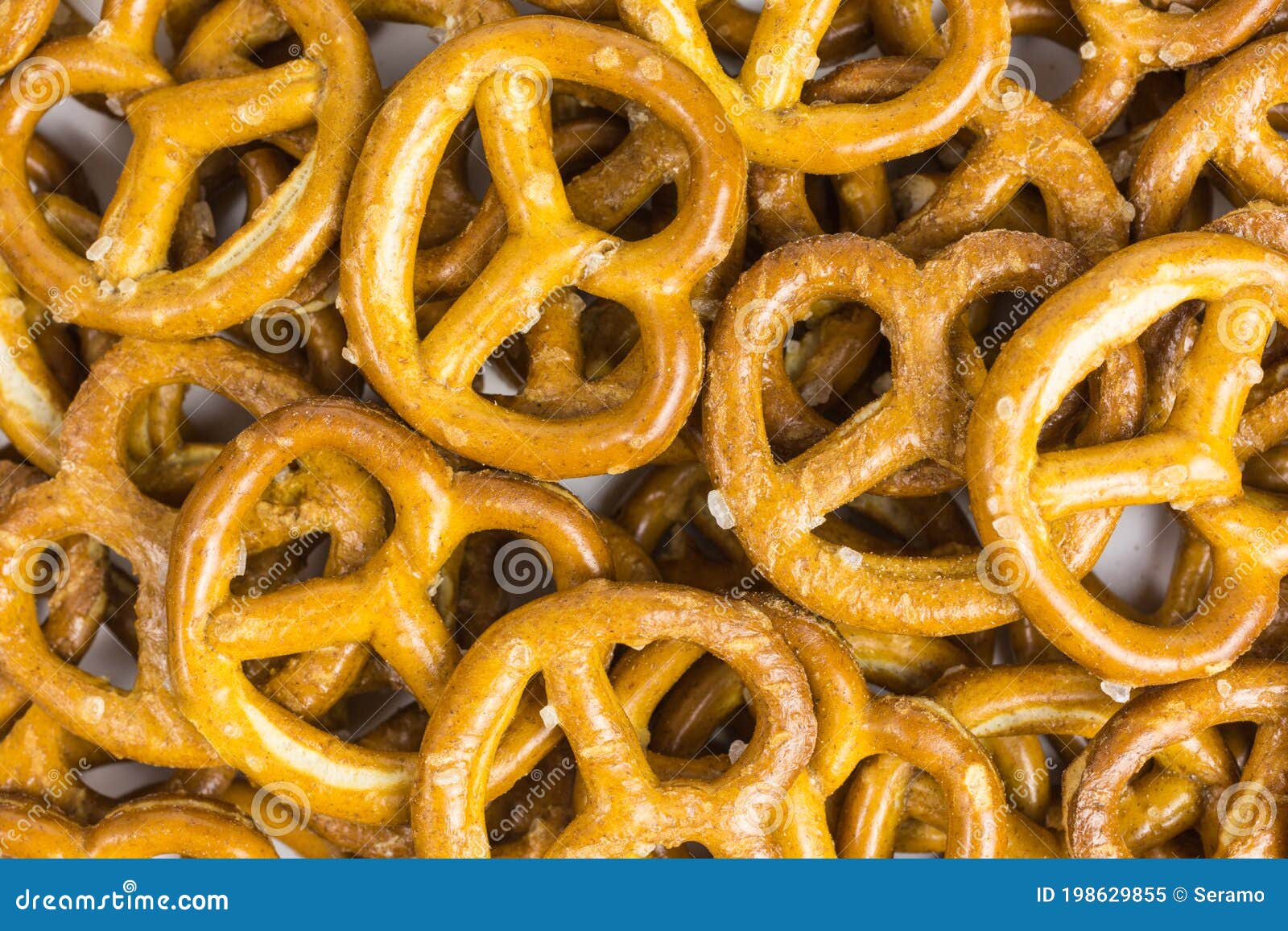 Mini pretzel background stock image. Image of brown - 198629855