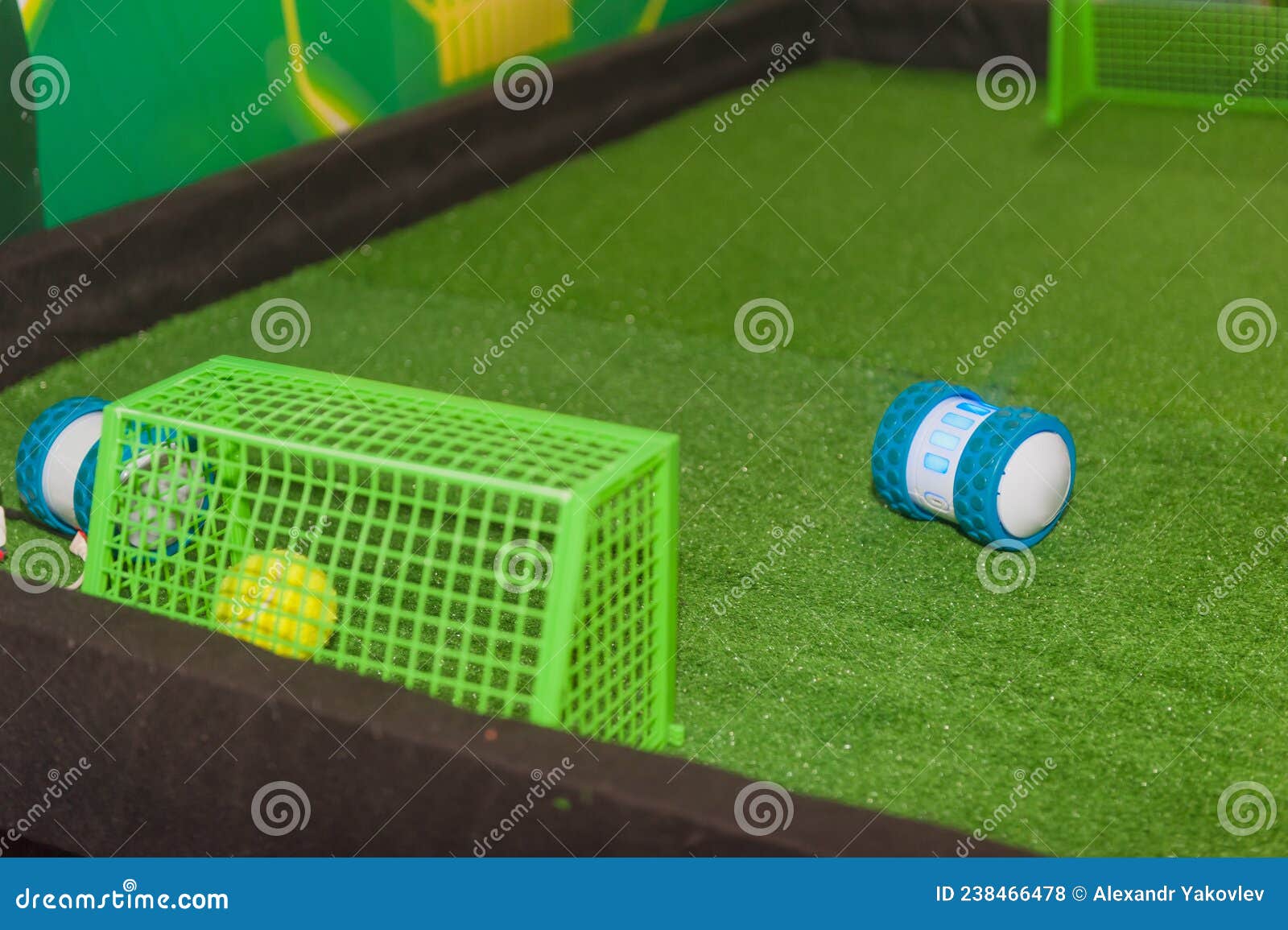 Mini Robot Scored a Goal in a Robot-controlled Human Match. Stock Photo ...