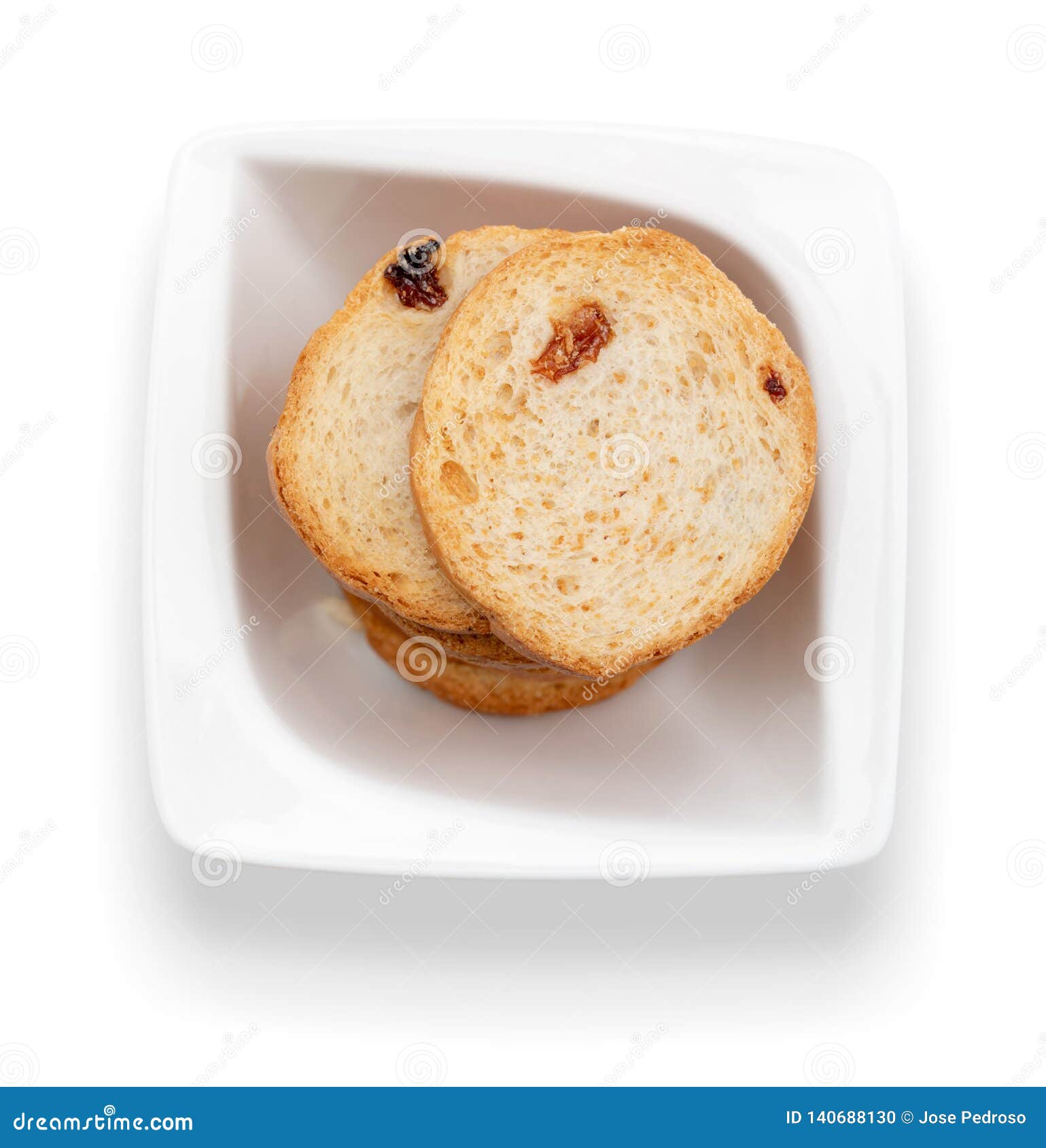 Mini Round Toasts of Bread with Raisins in White Bowl. Top View Stock ...