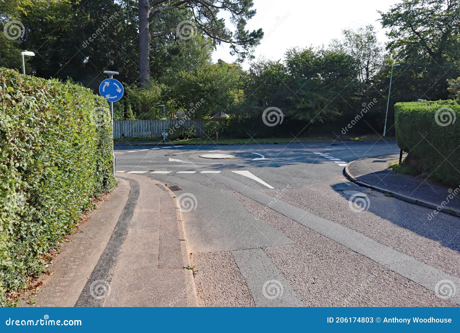 A Mini Roundabout on a Quiet Road in a Village in Devon, England Stock ...