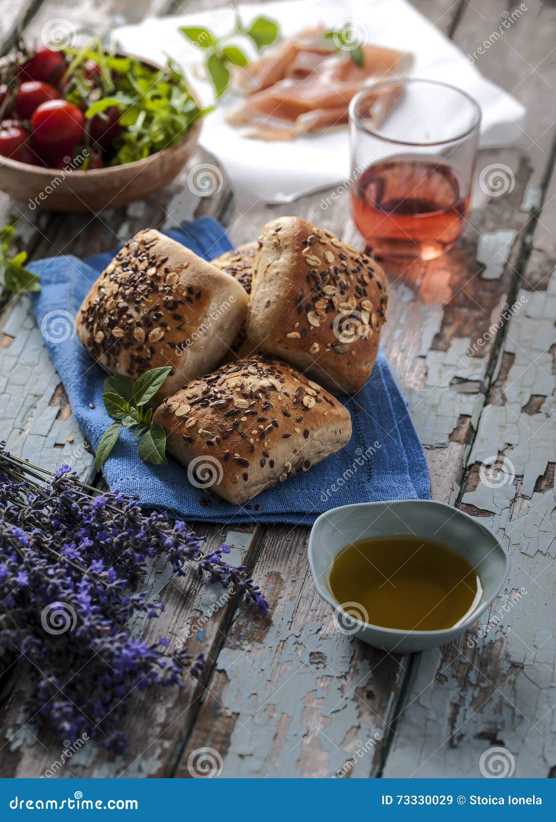 Mini Rustic Bread with Lavand Flower on the Side, Olive Oil, Rose Wine ...