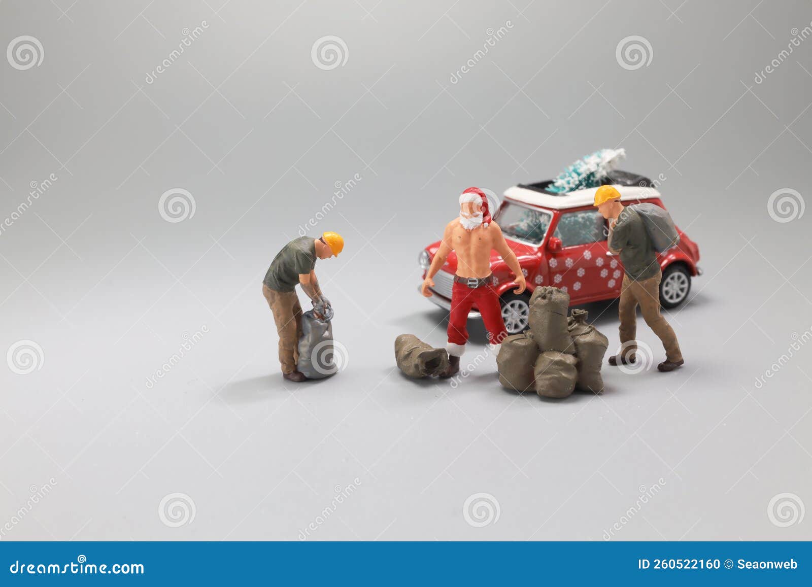 A Mini of Santa Claus with His Assistant Stock Photo - Image of blonde ...