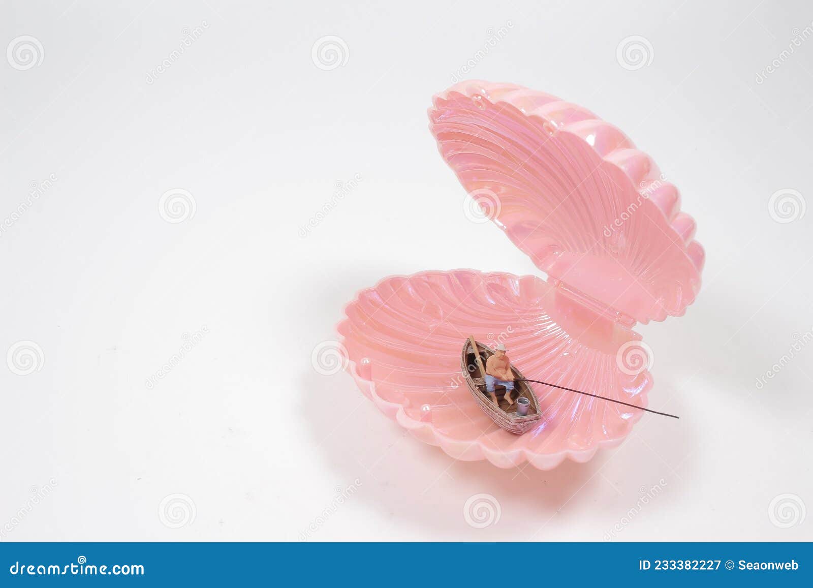 A Mini of Small Fish Boat on the Shell Stock Image - Image of design ...