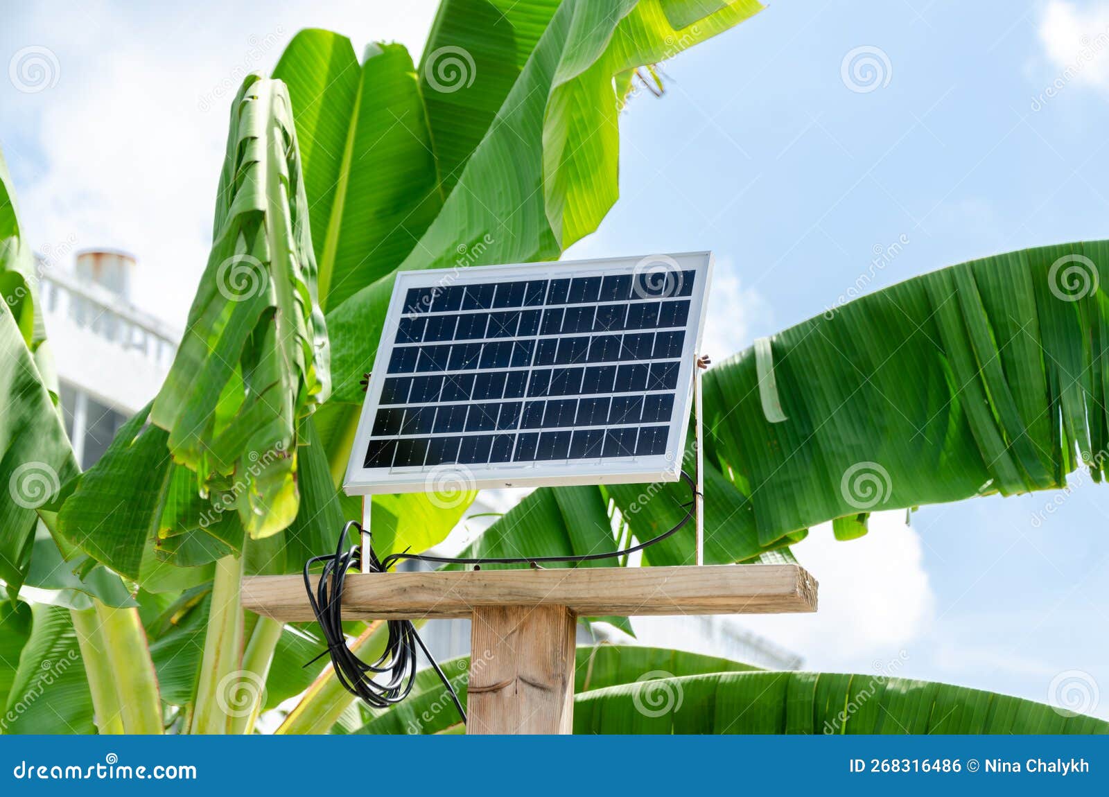 Mini Solar Battery Panel Outside. Concept: Saving Resources, Global ...