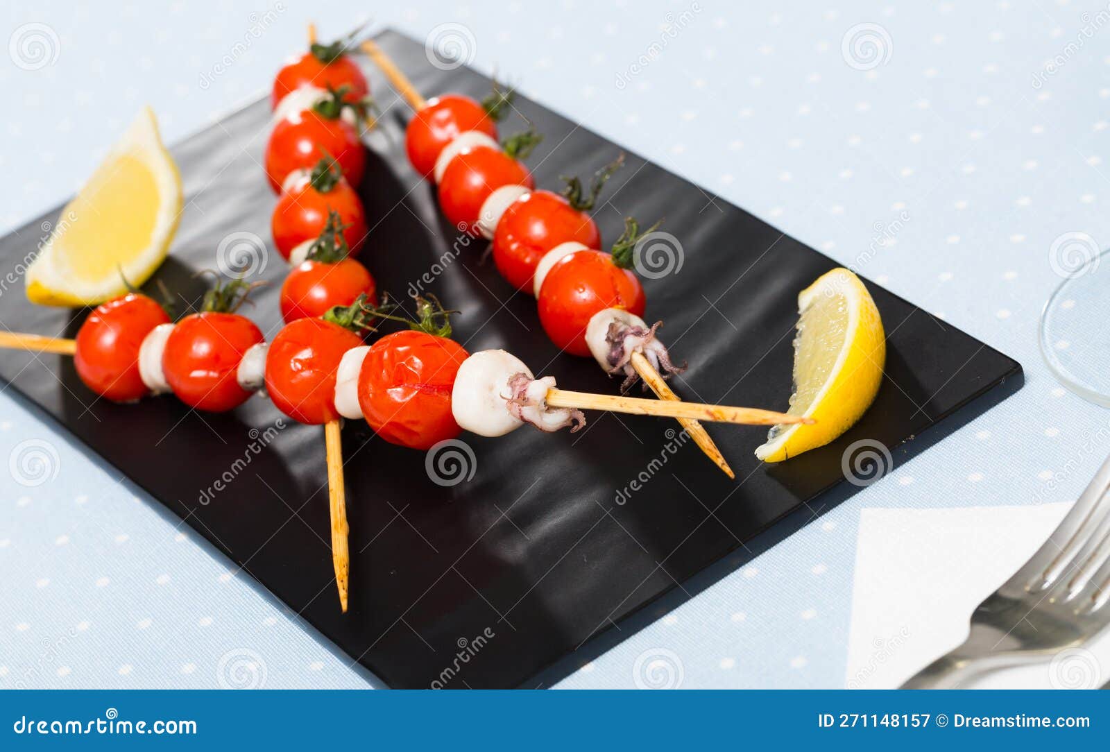 Mini Squids with Cherry Tomatoes Stock Image - Image of cooked, product ...