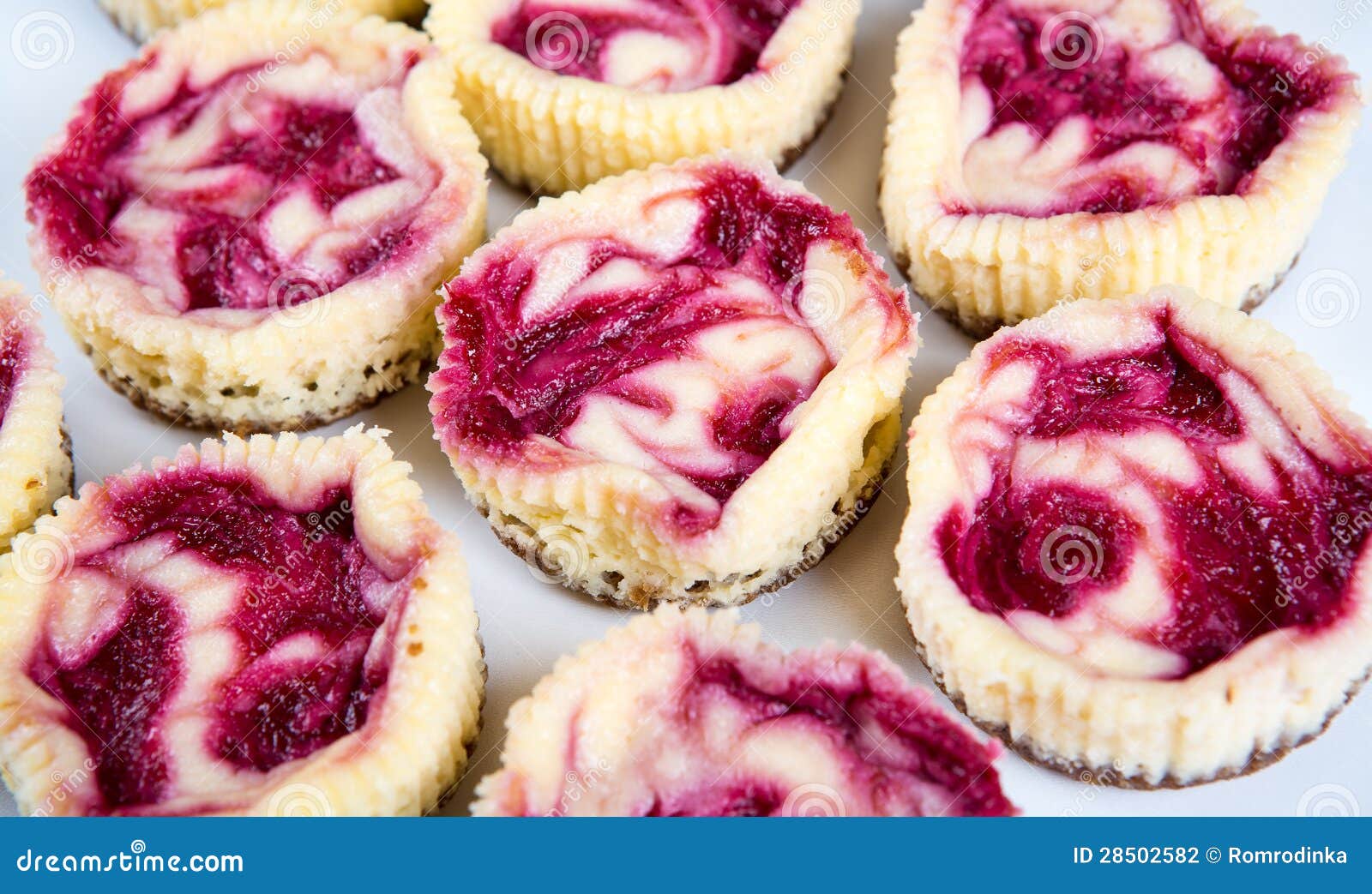 Mini Strawberry Cheesecakes in Muffin Forms Stock Photo - Image of ...