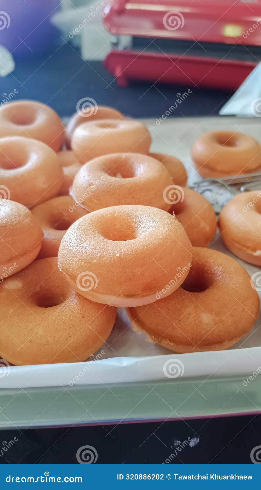 Mini Sugar Coated Doughnuts Piled on a White Plate Stock Photo - Image ...