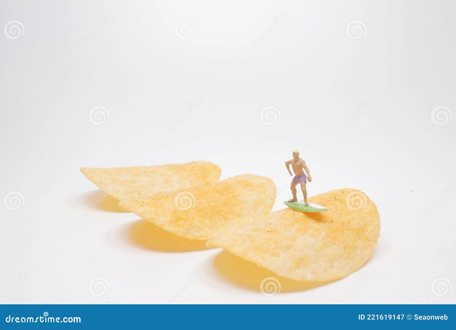 A Mini of Surfer , Surfing on Potato Chip Stock Image - Image of group ...