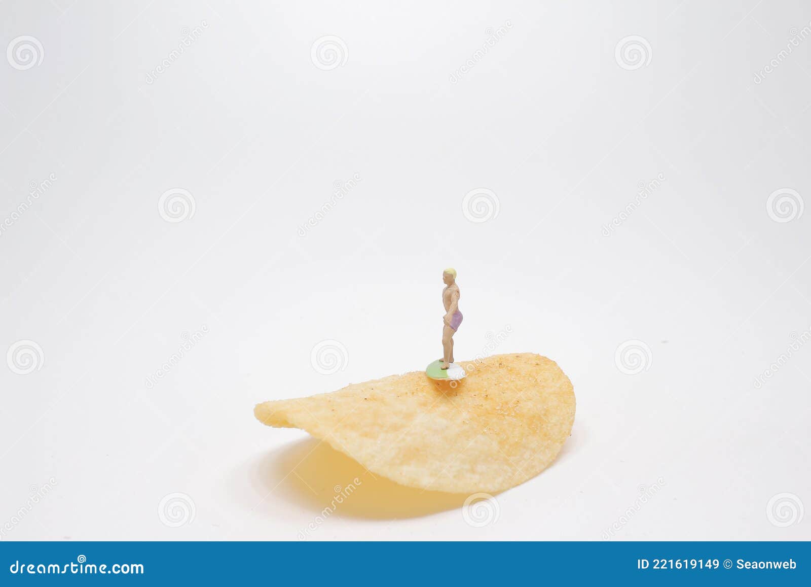 A Mini of Surfer , Surfing on Potato Chip Stock Image - Image of macro ...