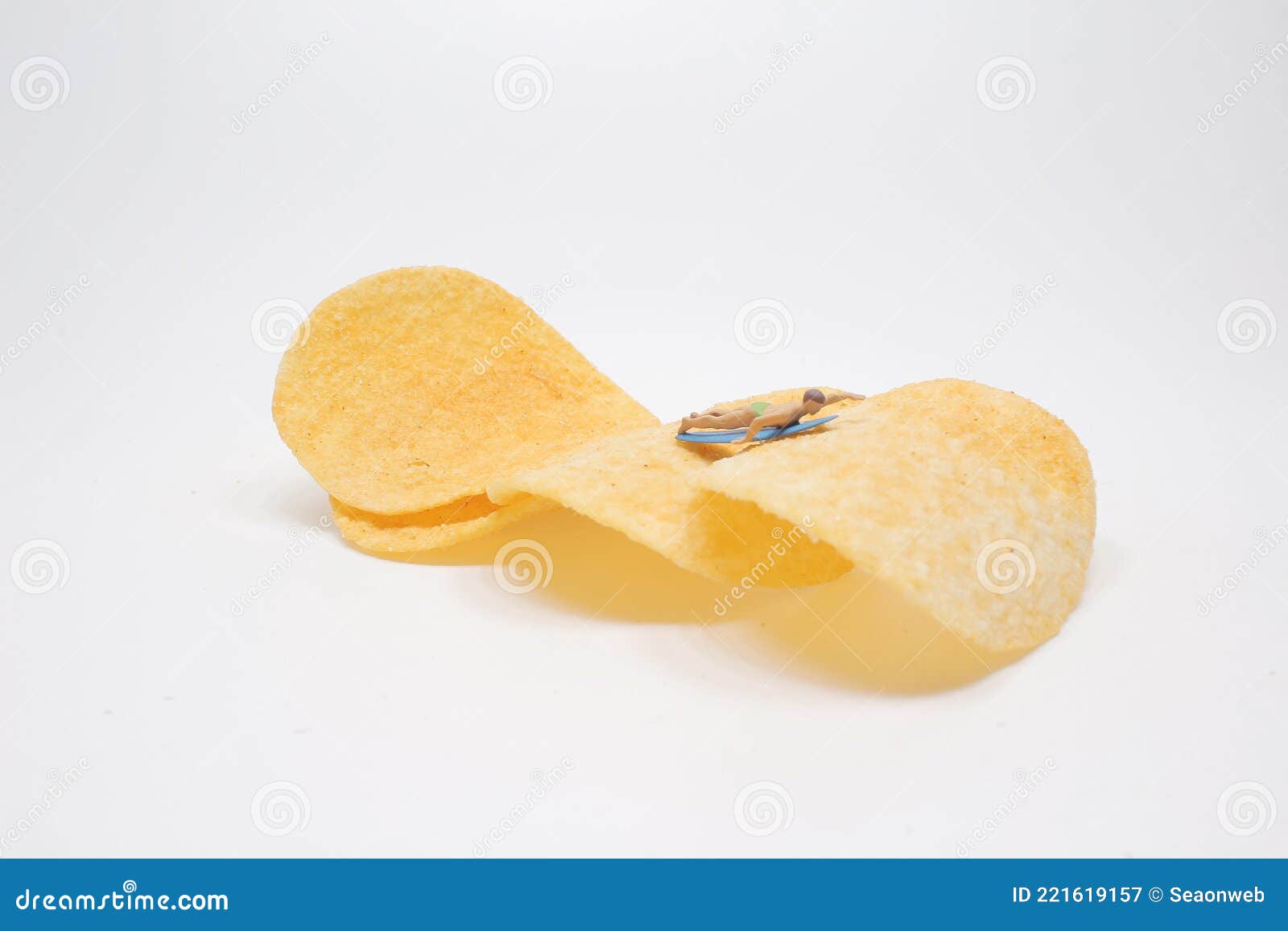 A Mini of Surfer , Surfing on Potato Chip Stock Image - Image of macro ...