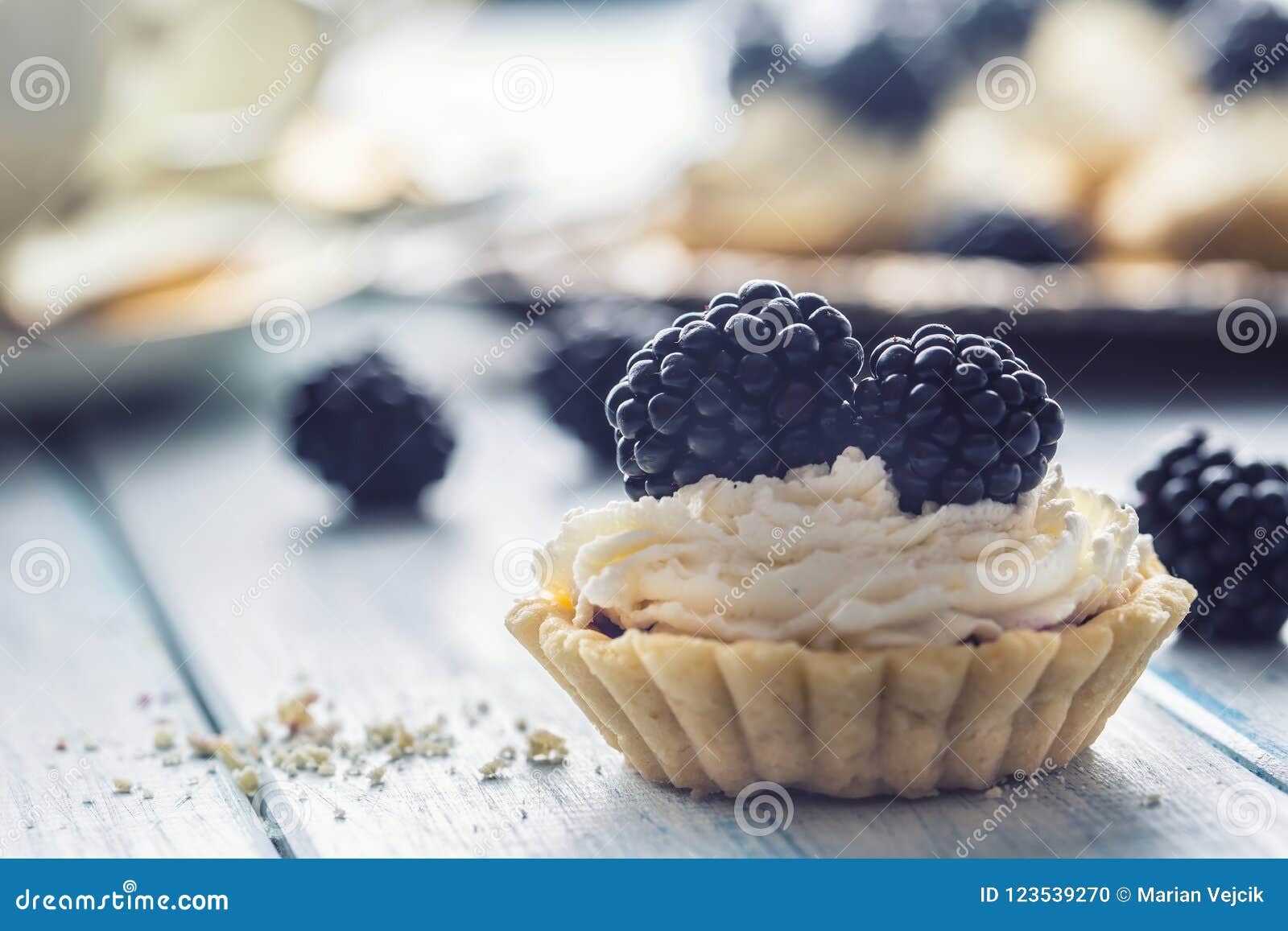 Mini Tartlets with Blackberries Whipped Cream and Coffee Stock Photo ...