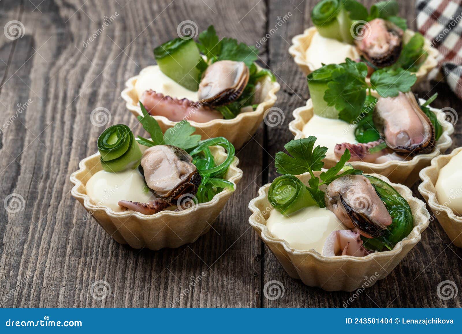 Mini Tarts Filled with Marinated Squid and Mussels on Wooden Table ...
