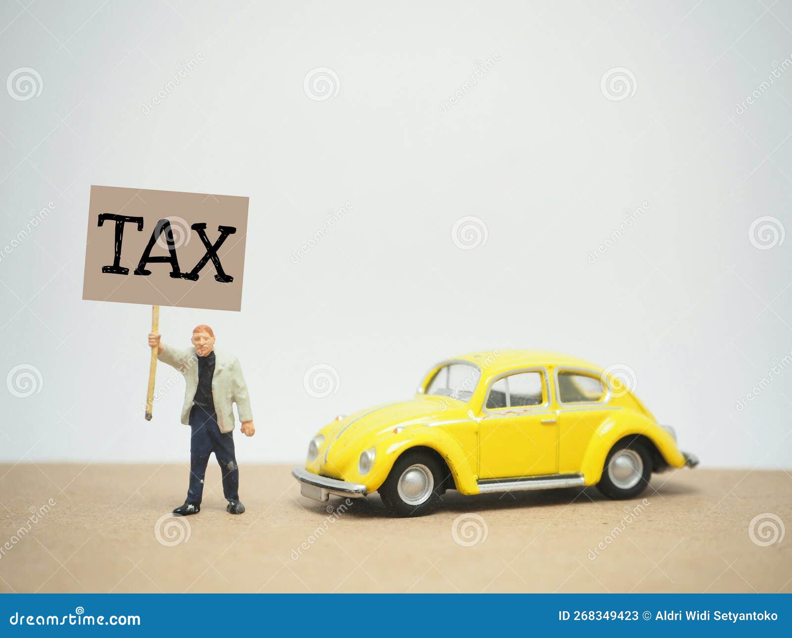 Mini Toy at Table with White Background. Car Tax Concept Design. VW Car ...