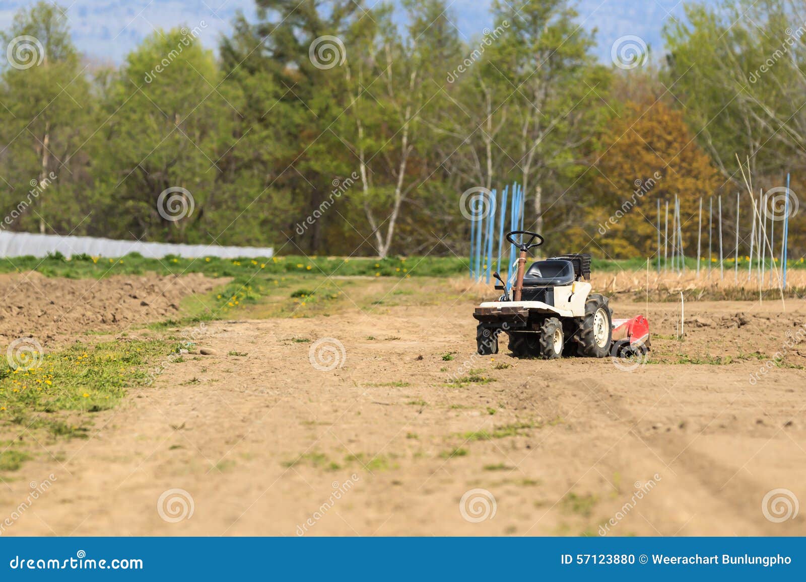 A Mini Tractor in the Land Field Stock Photo - Image of soil ...