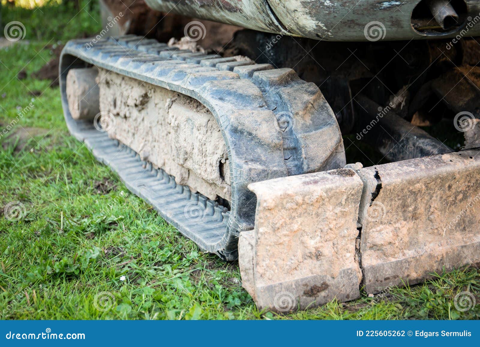 Mini Tractor Rubber Tracks. Construction Site and Equipment Stock Photo ...