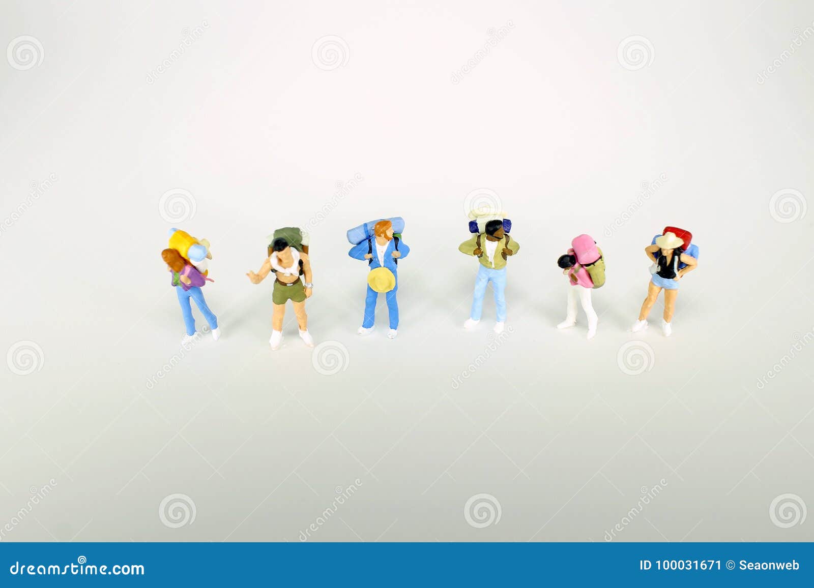 Mini Traveler Mini Figures with Backpack Standing Stock Image - Image ...