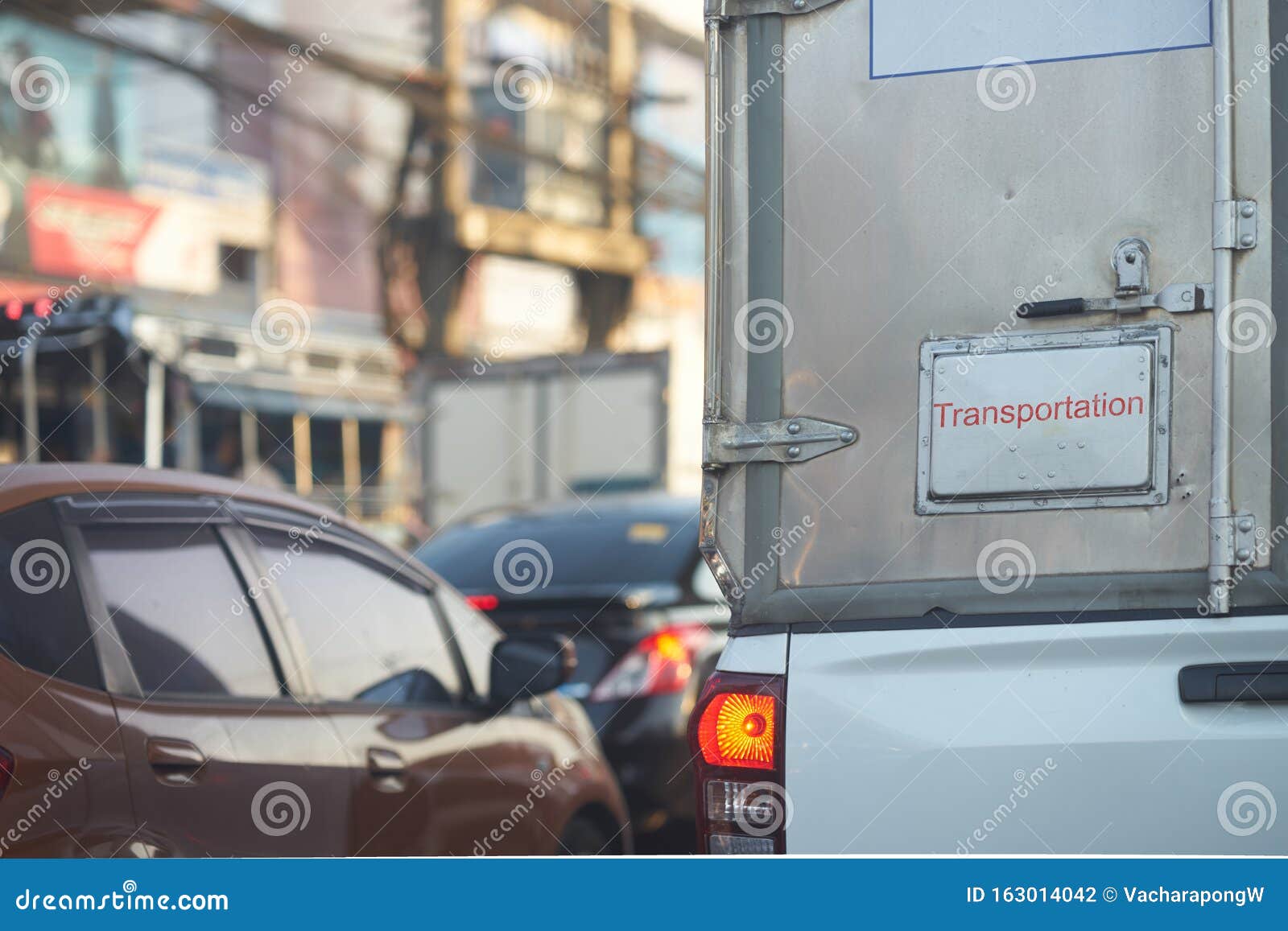Mini Truck in Logistic Transportation Concept on City Scape Stock Photo ...