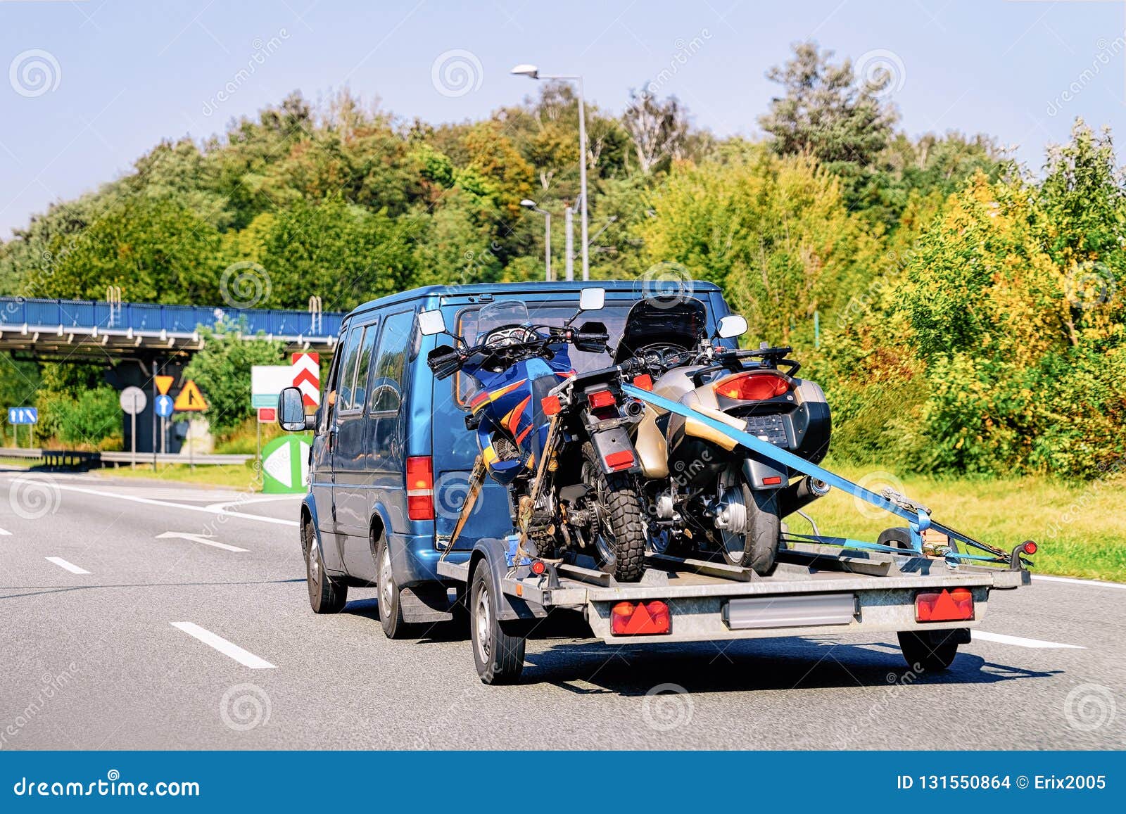 Mini Van with Motorcycles on Trailer in Road Stock Photo - Image of ...