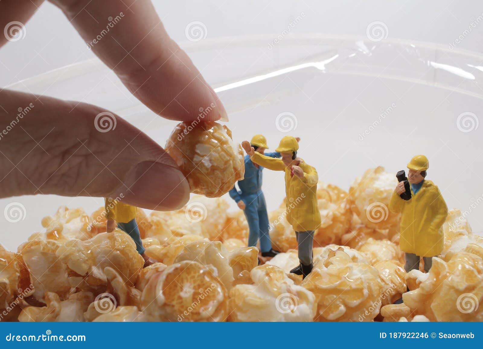 A Mini Worker Figure Face the Throw Popcorn Stock Photo - Image of ...