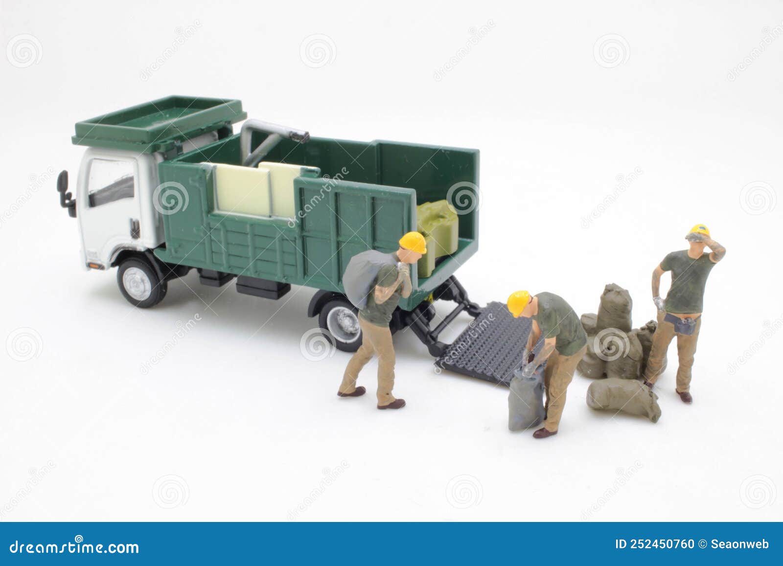 A Mini Worker Figure Move the Products Stock Photo - Image of brown ...
